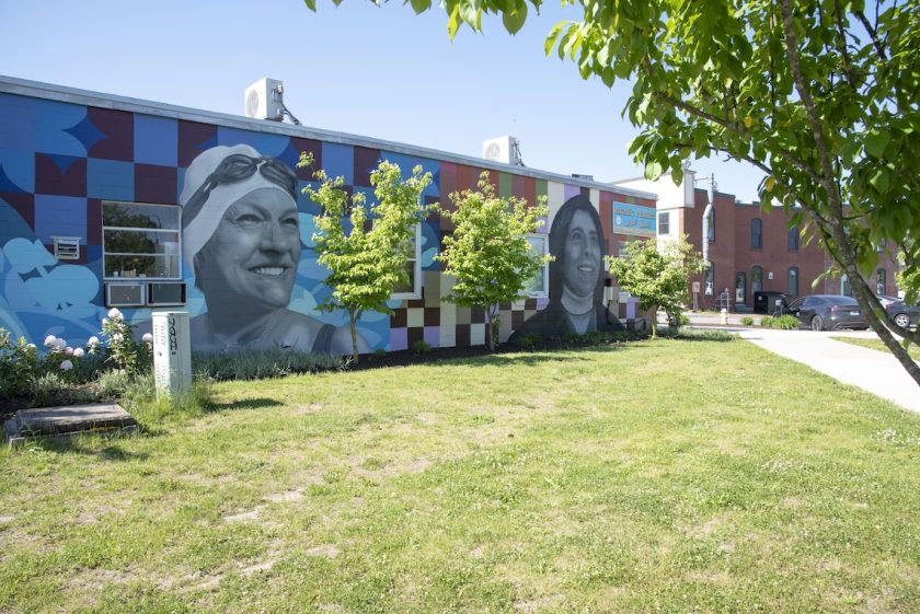 Artist-in-residence transforms wall from barrier to bonding experience ...